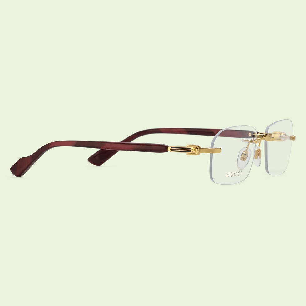 Rectangular optical frame in yellow gold-toned metal | GUCCI® AE