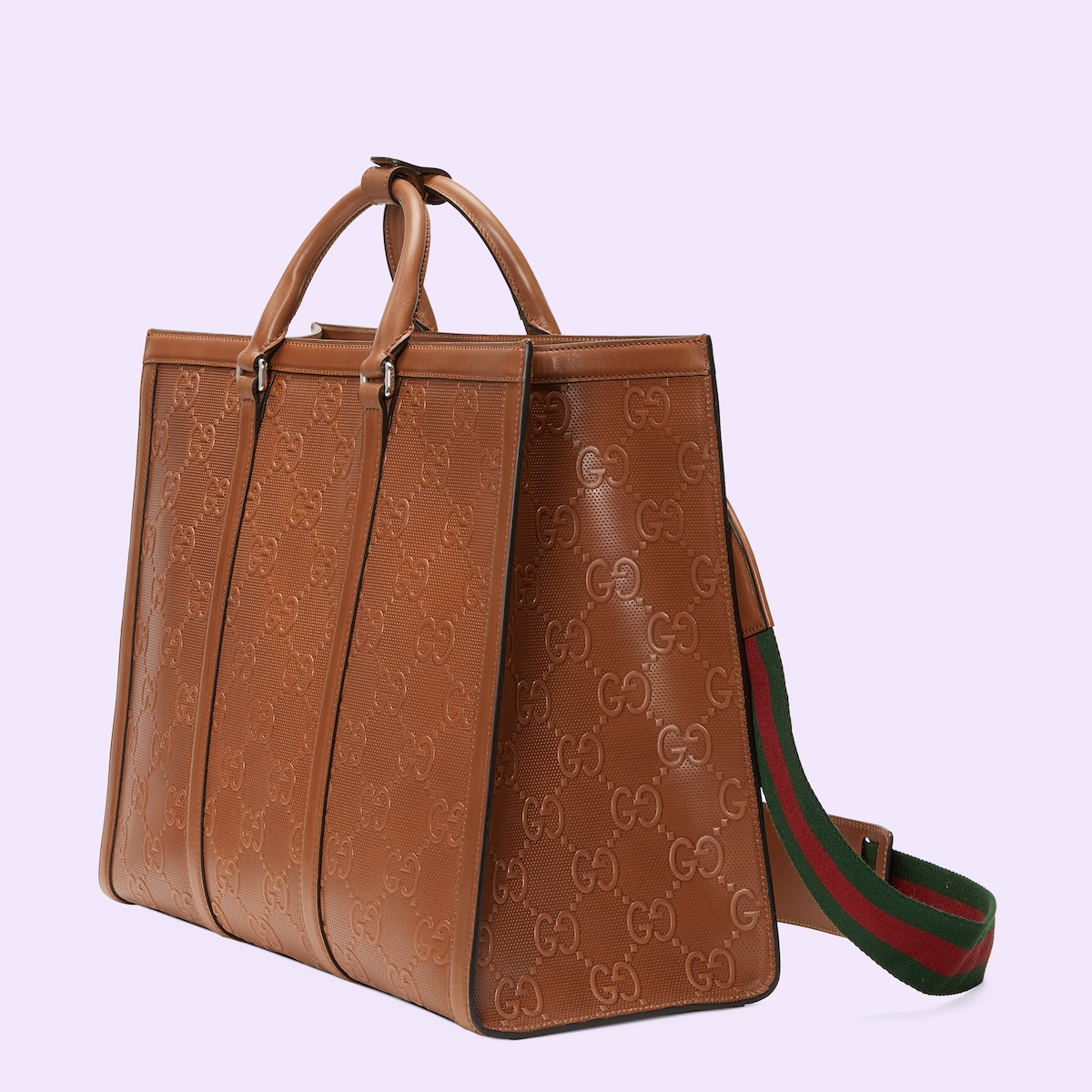GG embossed tote bag in brown leather | GUCCI® AE