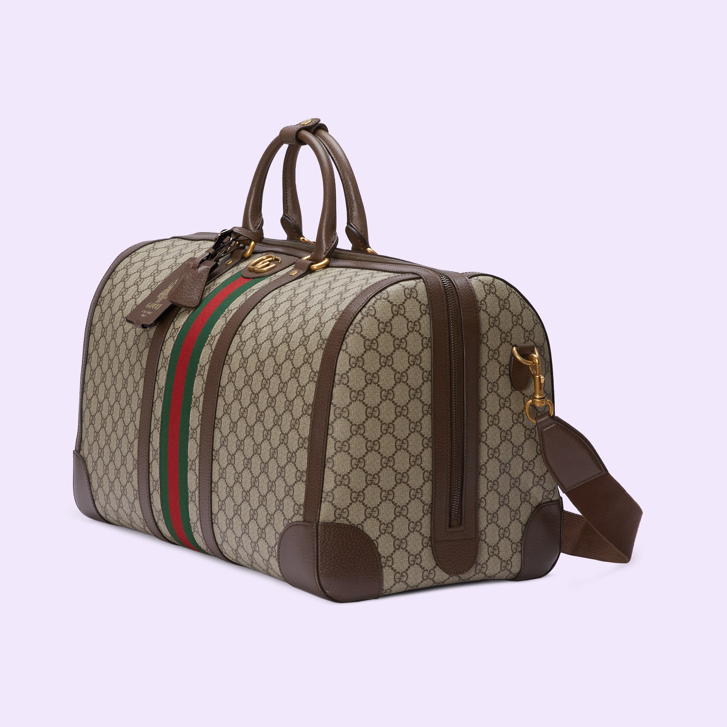 Gucci Savoy large duffle bag in beige and ebony Supreme | GUCCI® SI