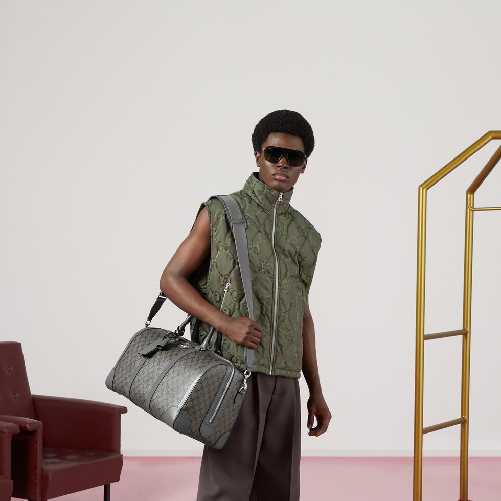 Gucci Savoy small duffle bag in grey and black Supreme | GUCCI® NO